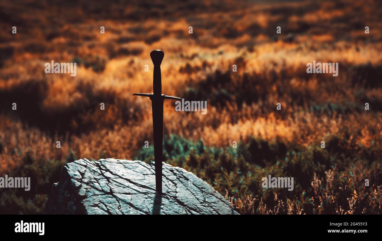 Famous sword excalibur of King Arthur in the rock Stock Photo - Alamy