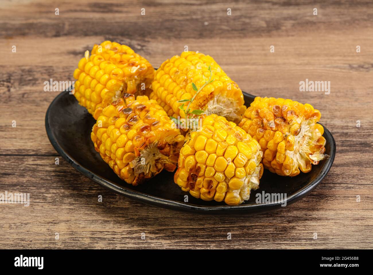 Grilled hot corn with oil and salt Stock Photo - Alamy