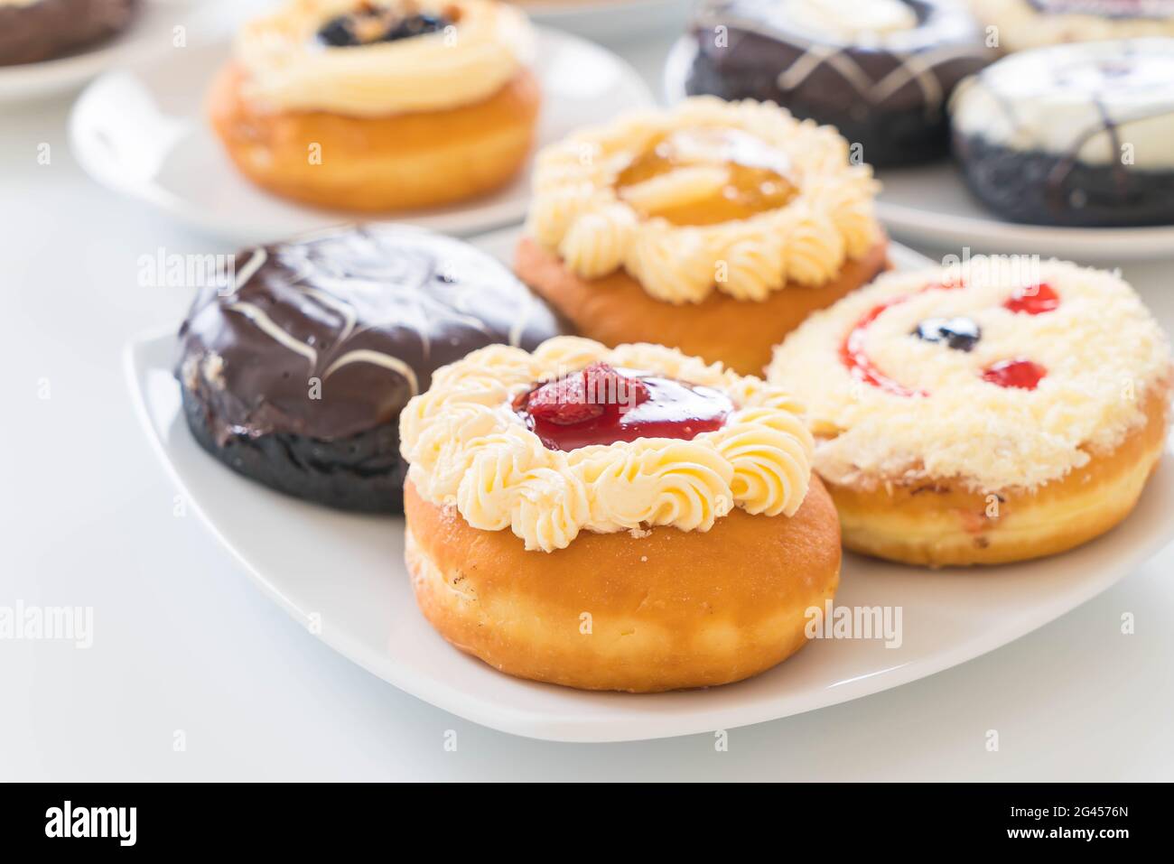 Donuts served on table hi-res stock photography and images - Alamy