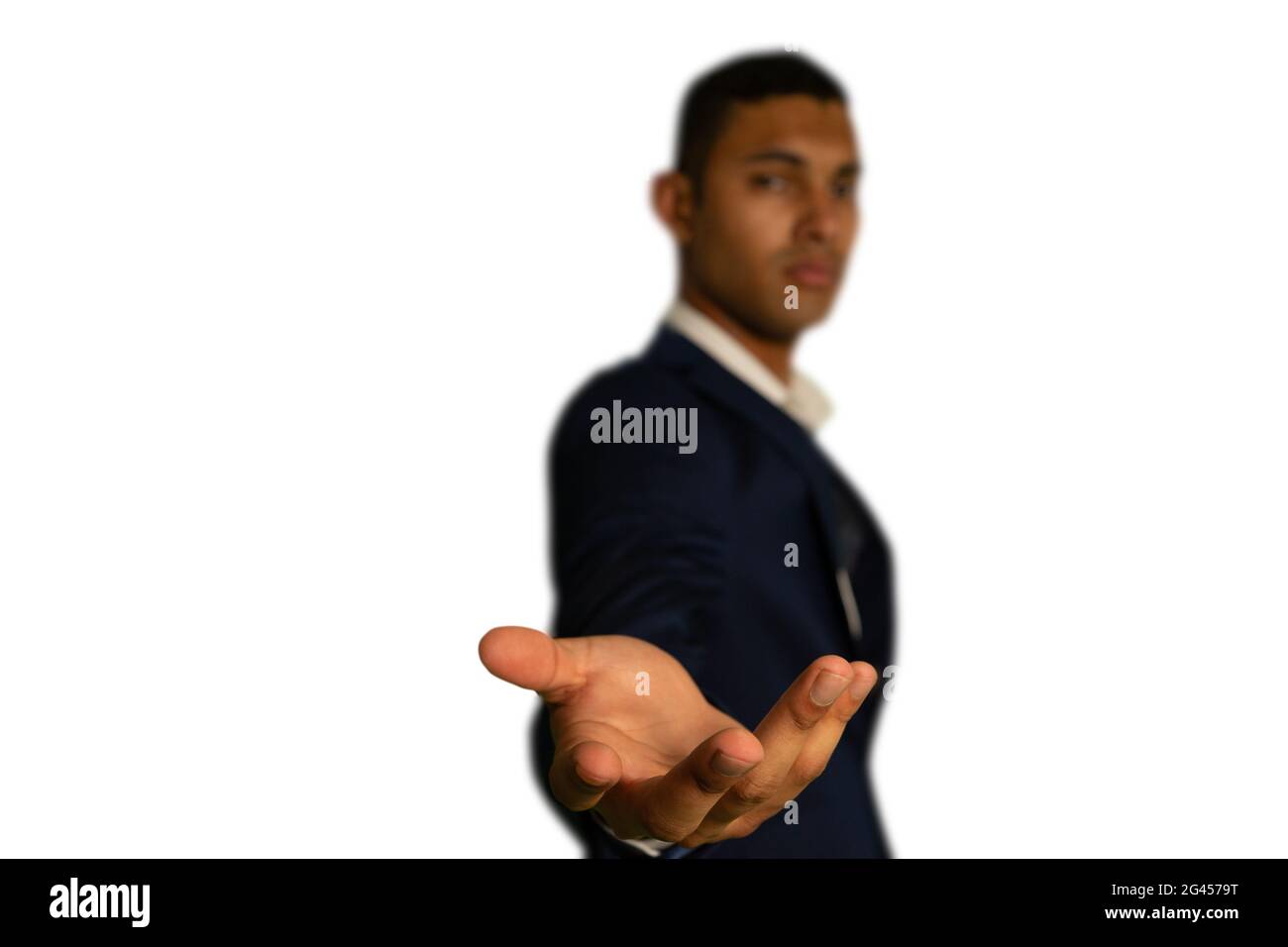 Businessman with arm extended and hand out Stock Photo - Alamy