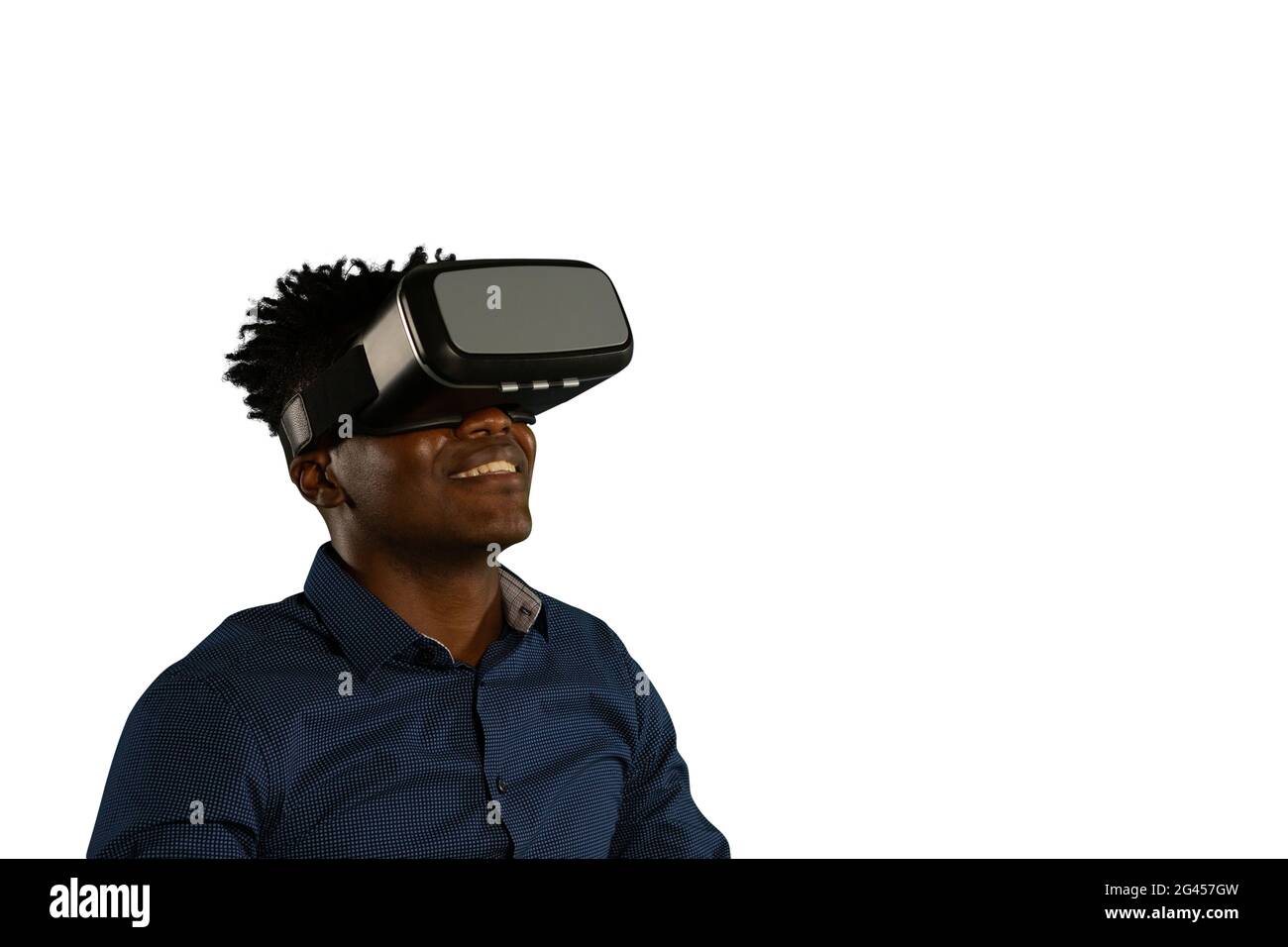 Young businessman using a VR headset Stock Photo - Alamy