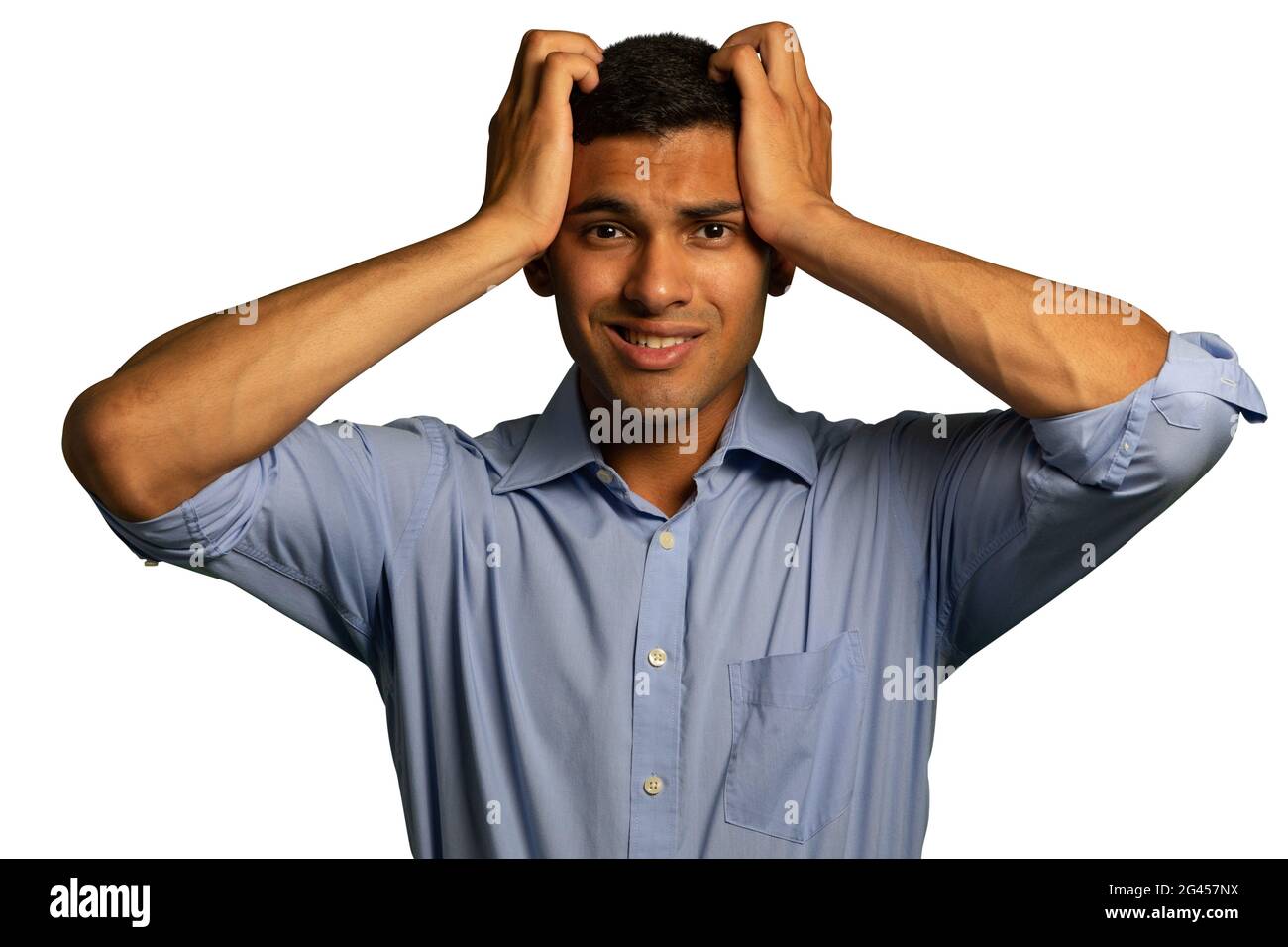 Stressed young businessman holding his head Stock Photo - Alamy