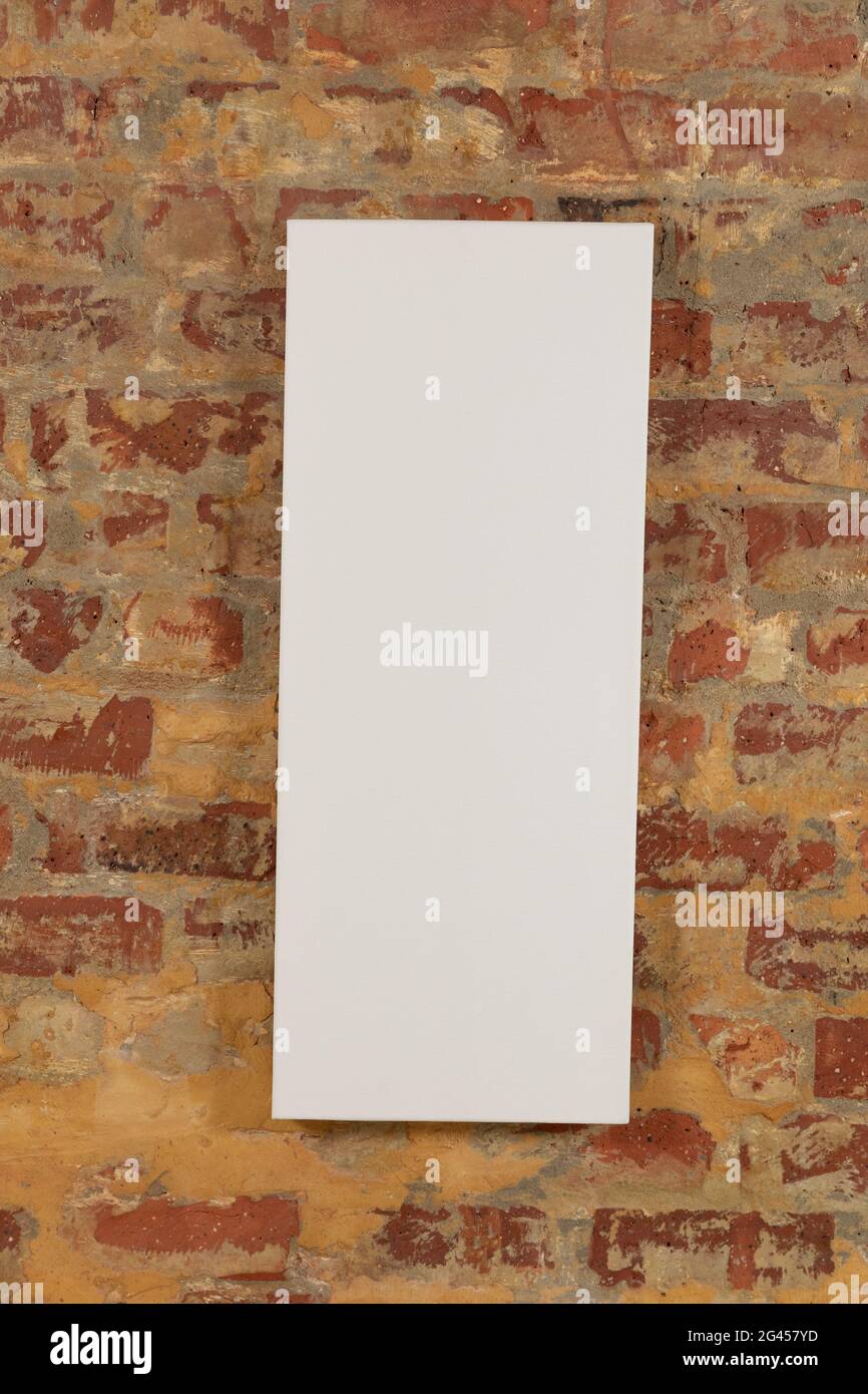 Blank canvas and brick wall Stock Photo - Alamy