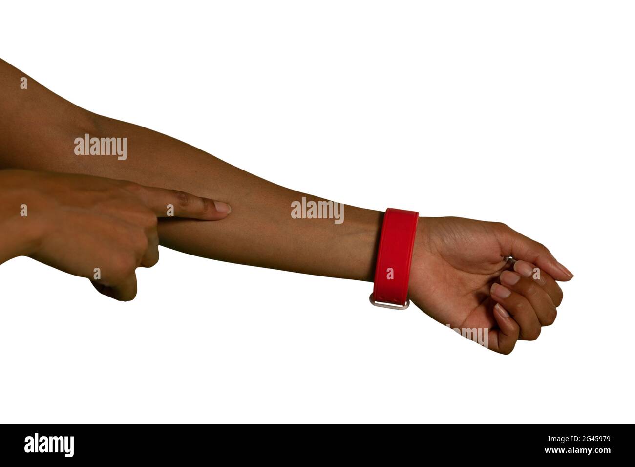Woman pointing to her arm Stock Photo - Alamy