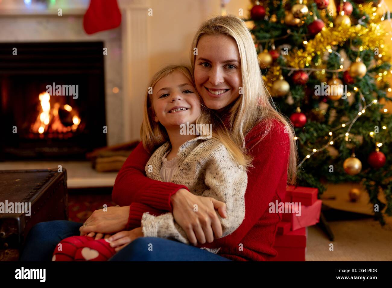Family at home at Christmas time Stock Photo - Alamy