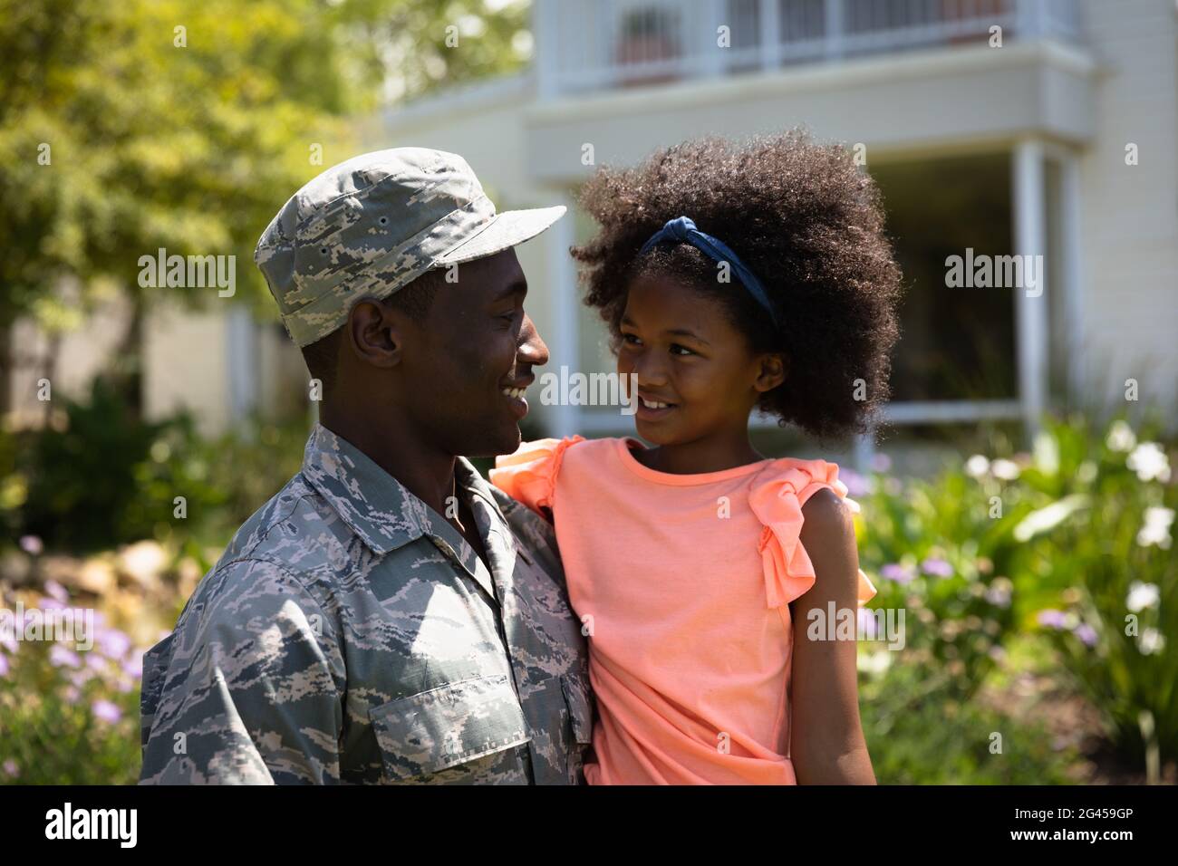Black family welcoming soldier hi-res stock photography and images - Alamy