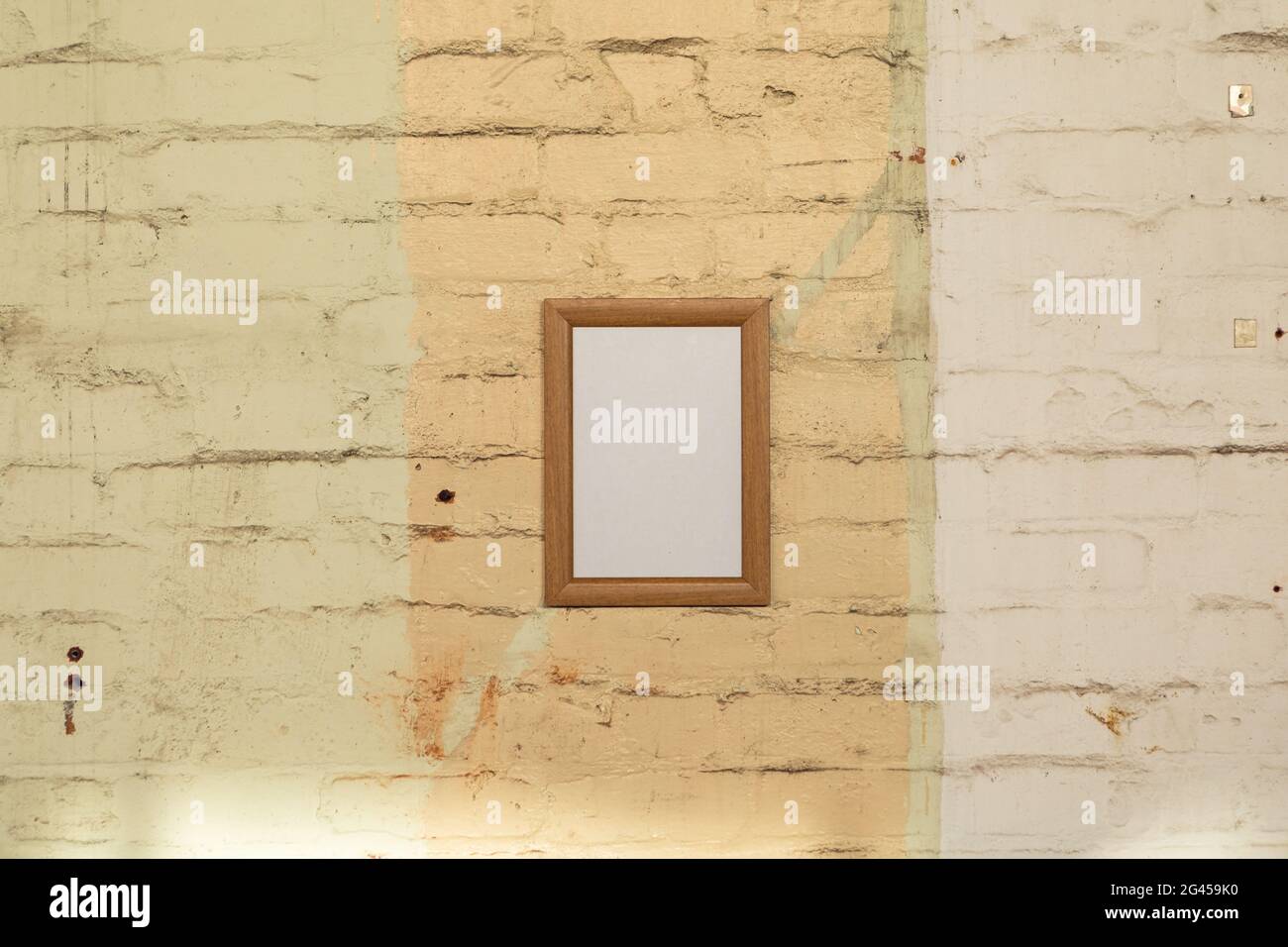 Blank picture hanging on a wall Stock Photo - Alamy