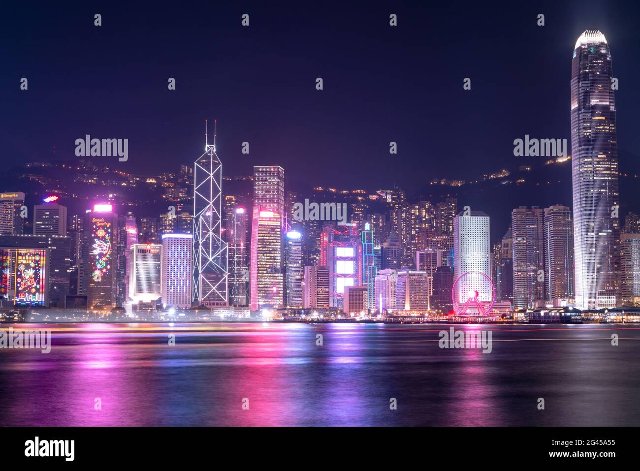 The incredible night cityscape view of lights on the water on Victoria ...