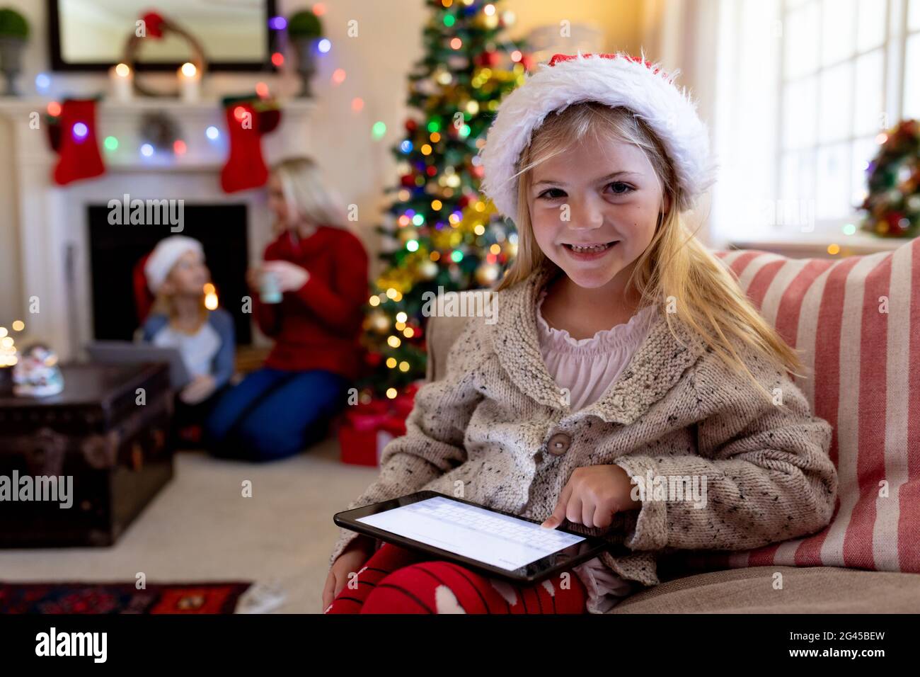 Family at home at Christmas time Stock Photo - Alamy