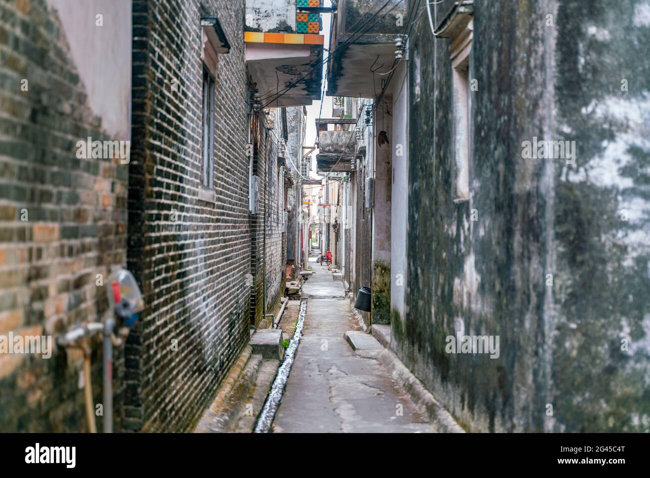 The rural street view of old traditional fisherman village on Hainan in ...