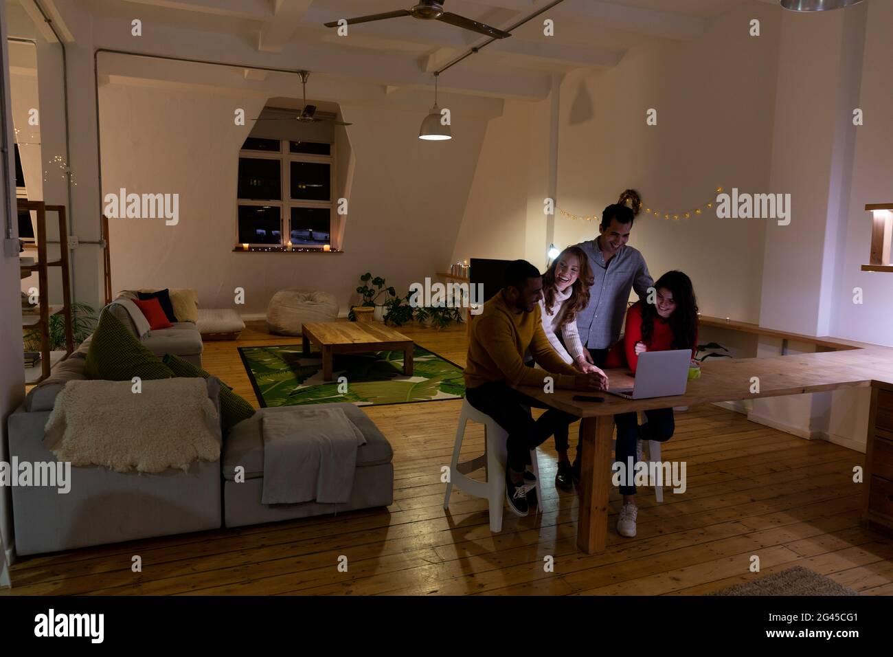 Millennial adult friends socialising together at home Stock Photo - Alamy