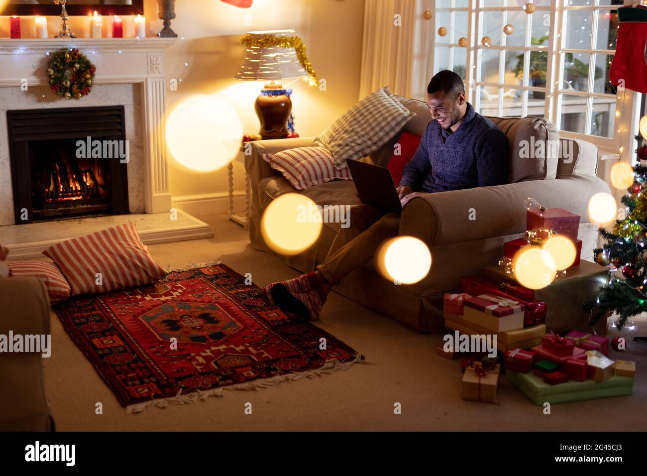 Man at home at Christmas time Stock Photo - Alamy