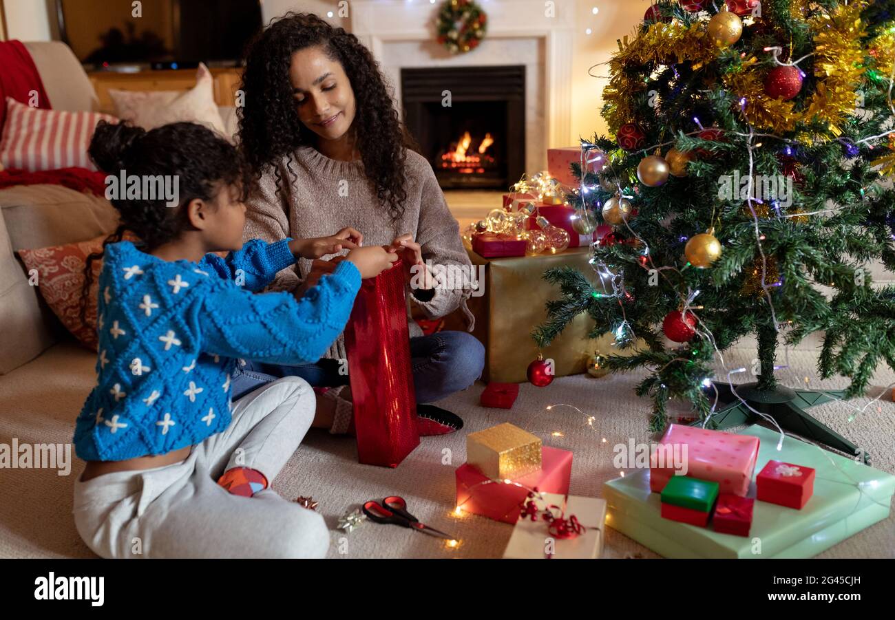 Family at home at Christmas time Stock Photo - Alamy