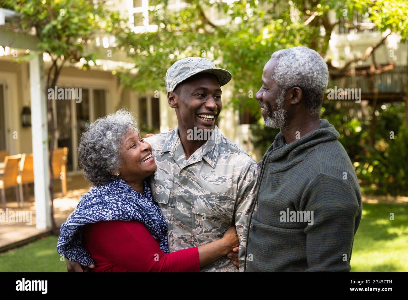 Soldier with parents Stock Photo - Alamy