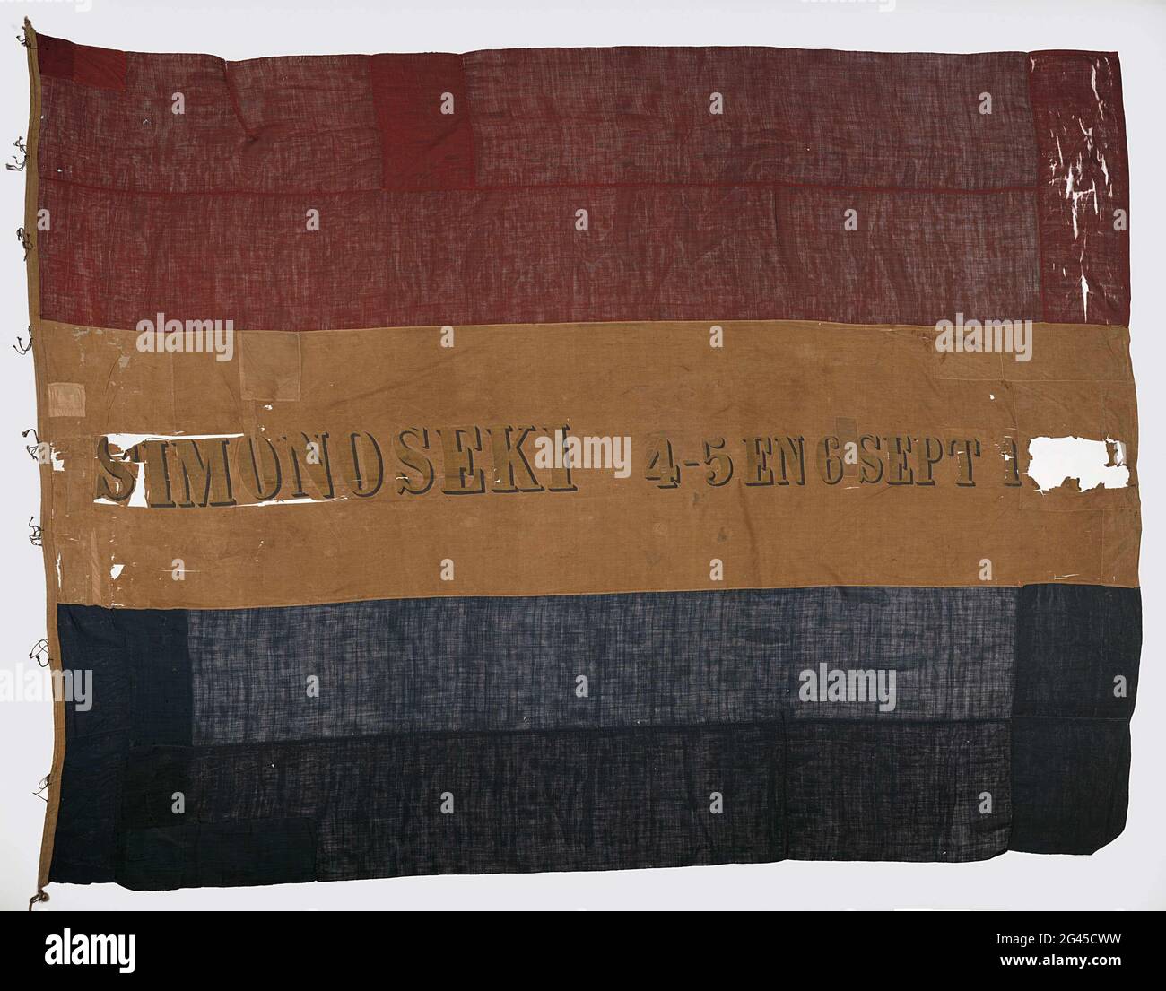 Ship flag. Dutch tricolor with inscription in black and gold on both ...