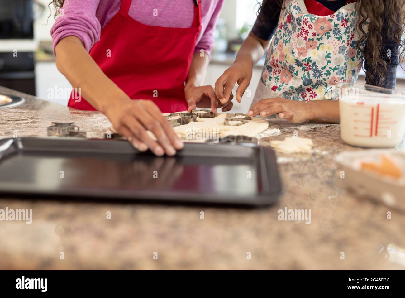 Family making Christmas cookies at home Stock Photo - Alamy
