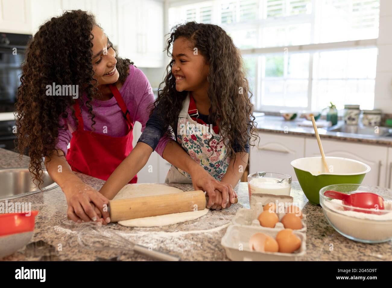 Family making Christmas cookies at home Stock Photo - Alamy