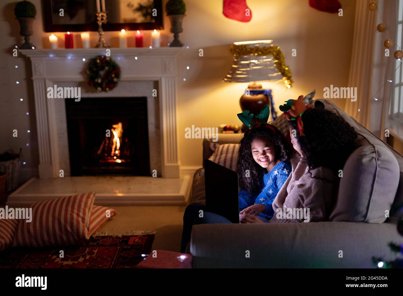 Family at home at Christmas time Stock Photo - Alamy