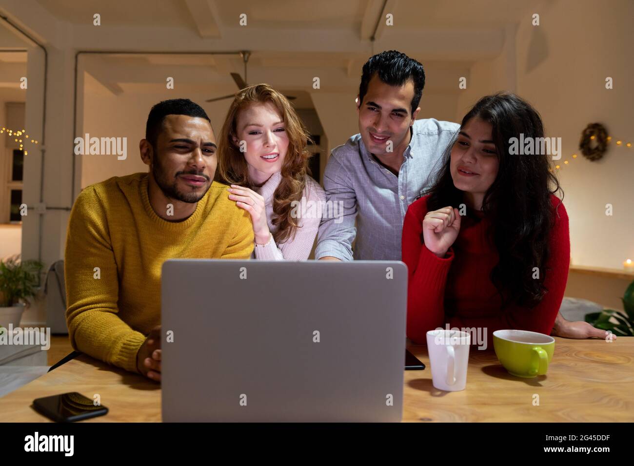 Millennial adult friends socialising together at home Stock Photo - Alamy