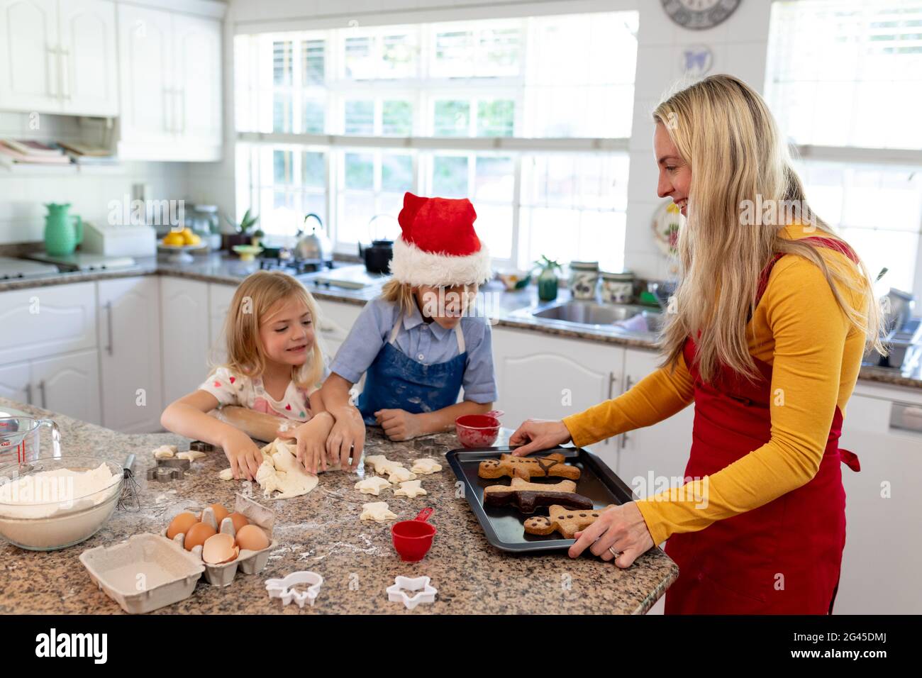 Family making Christmas cookies at home Stock Photo - Alamy