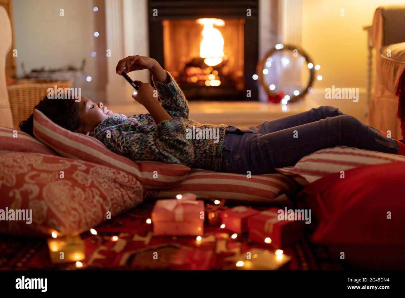 Girl at home at Christmas time Stock Photo - Alamy