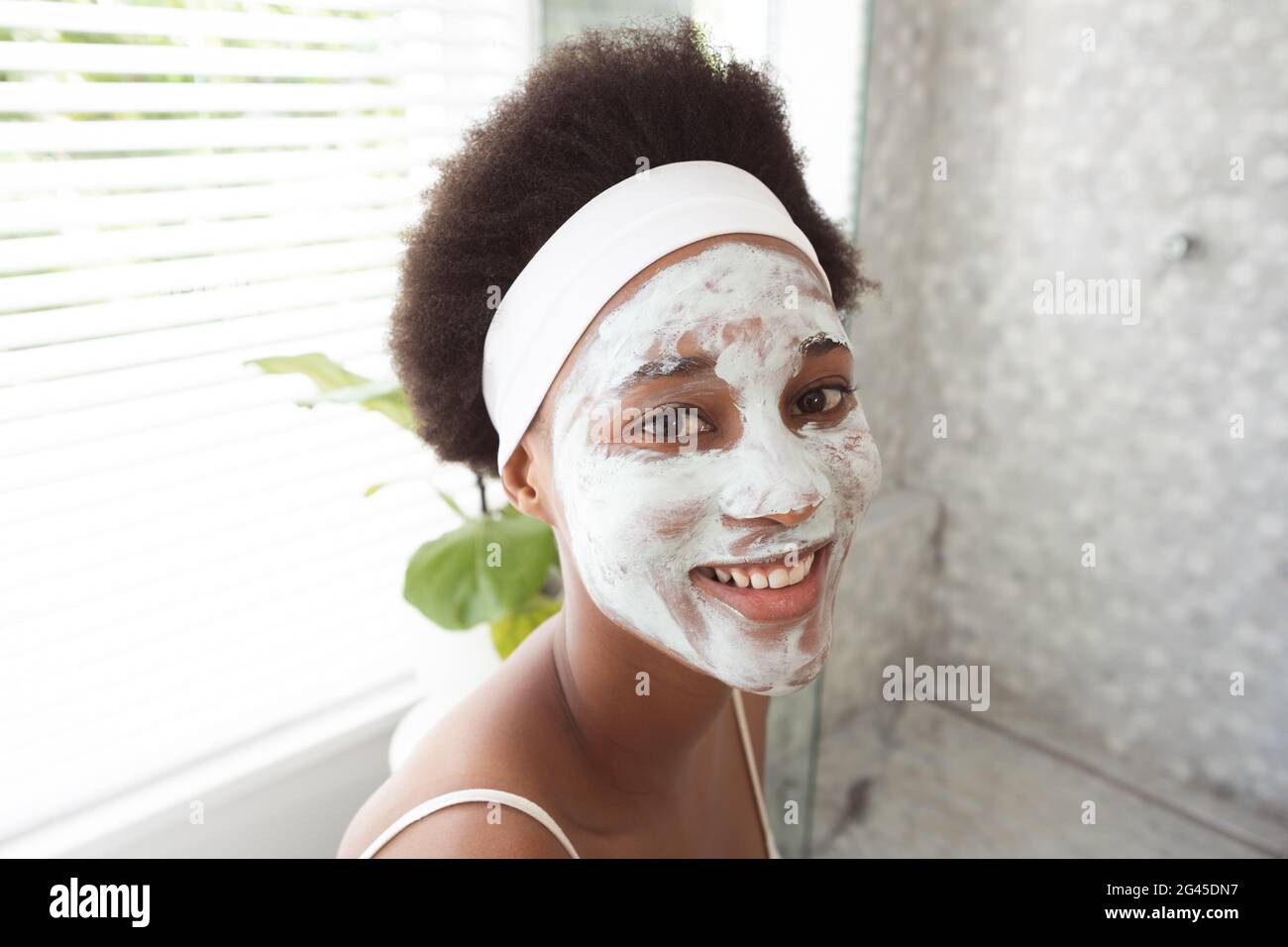 Portrait of woman with face mask Stock Photo - Alamy