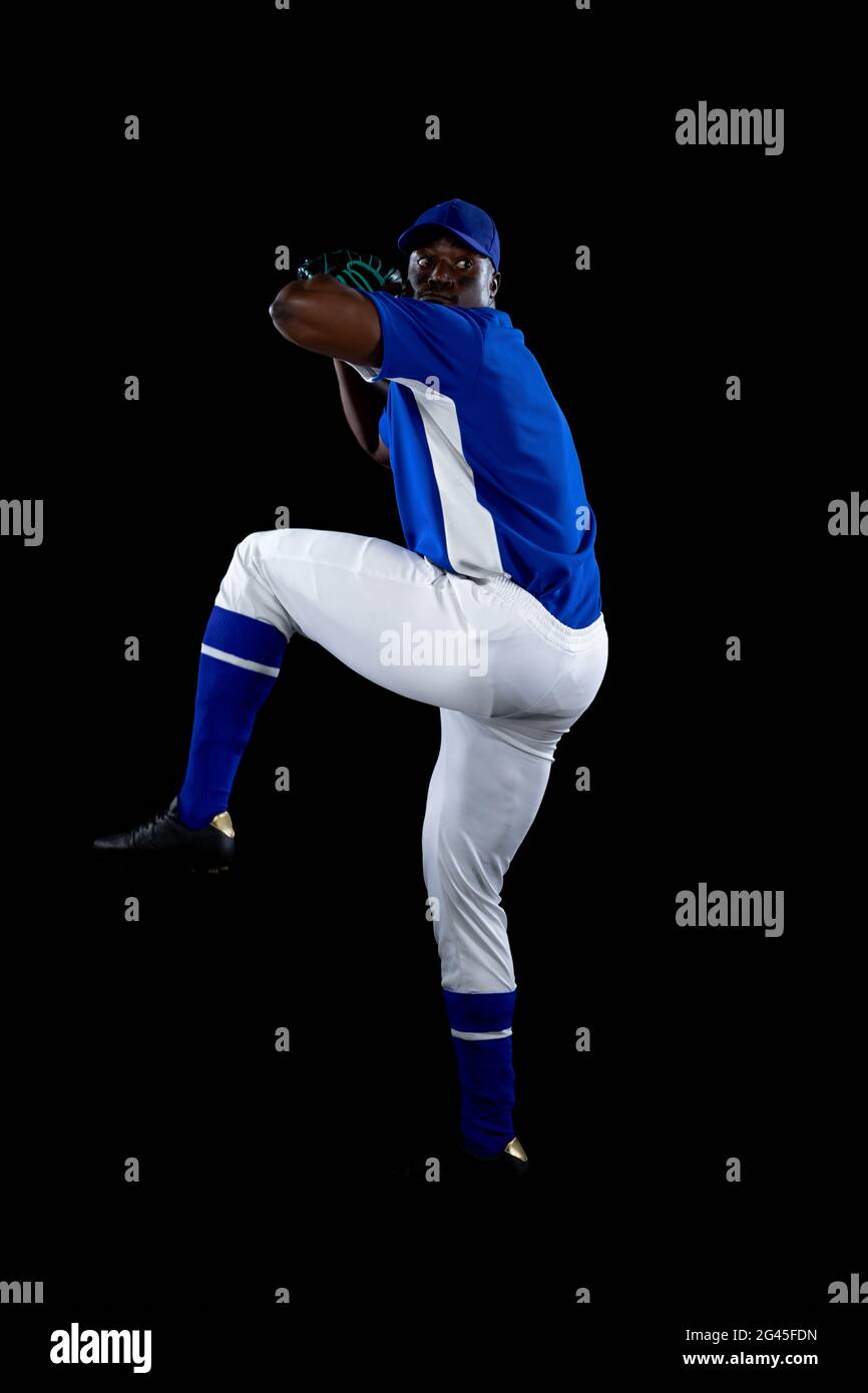 Black man pitching baseball hi-res stock photography and images - Alamy