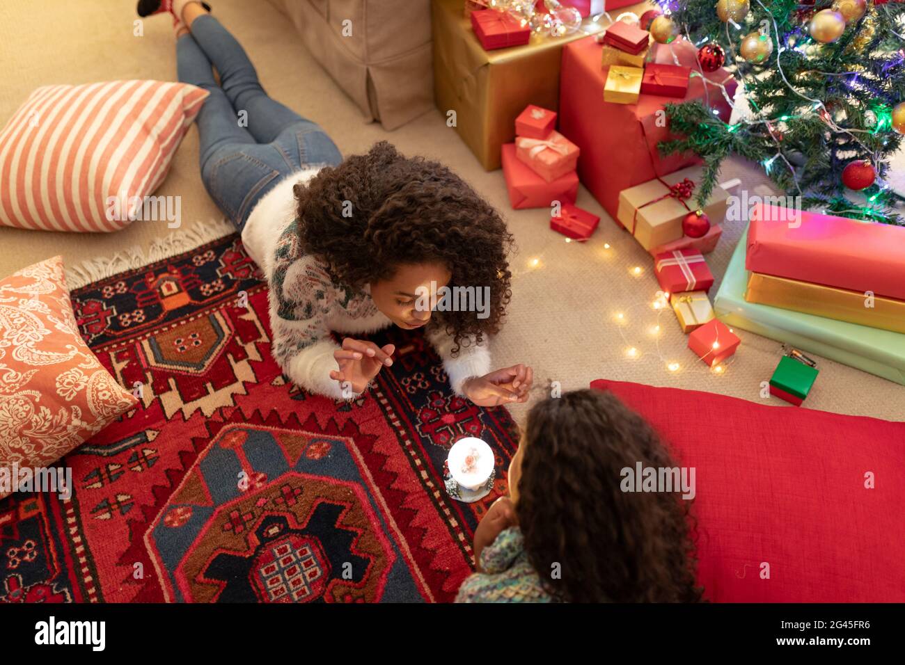 Family at home at Christmas time Stock Photo - Alamy