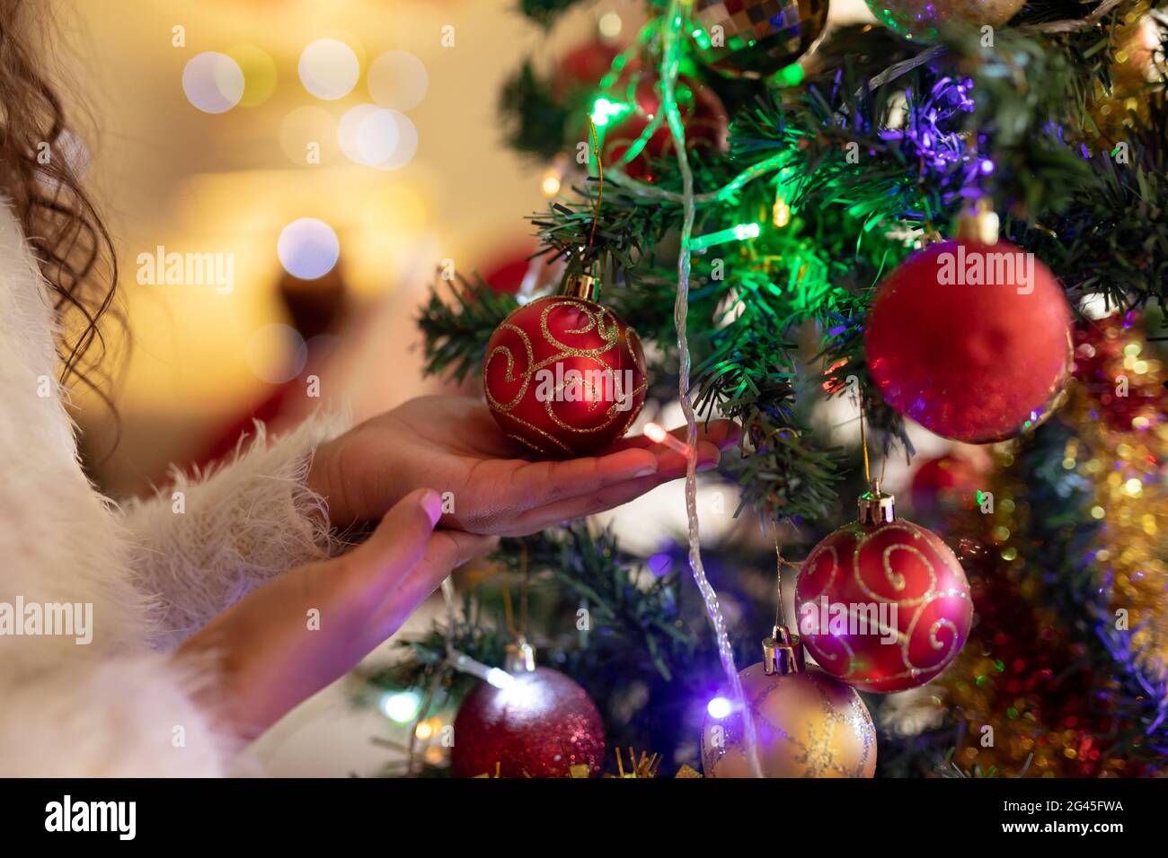 Girl at home at Christmas time Stock Photo - Alamy