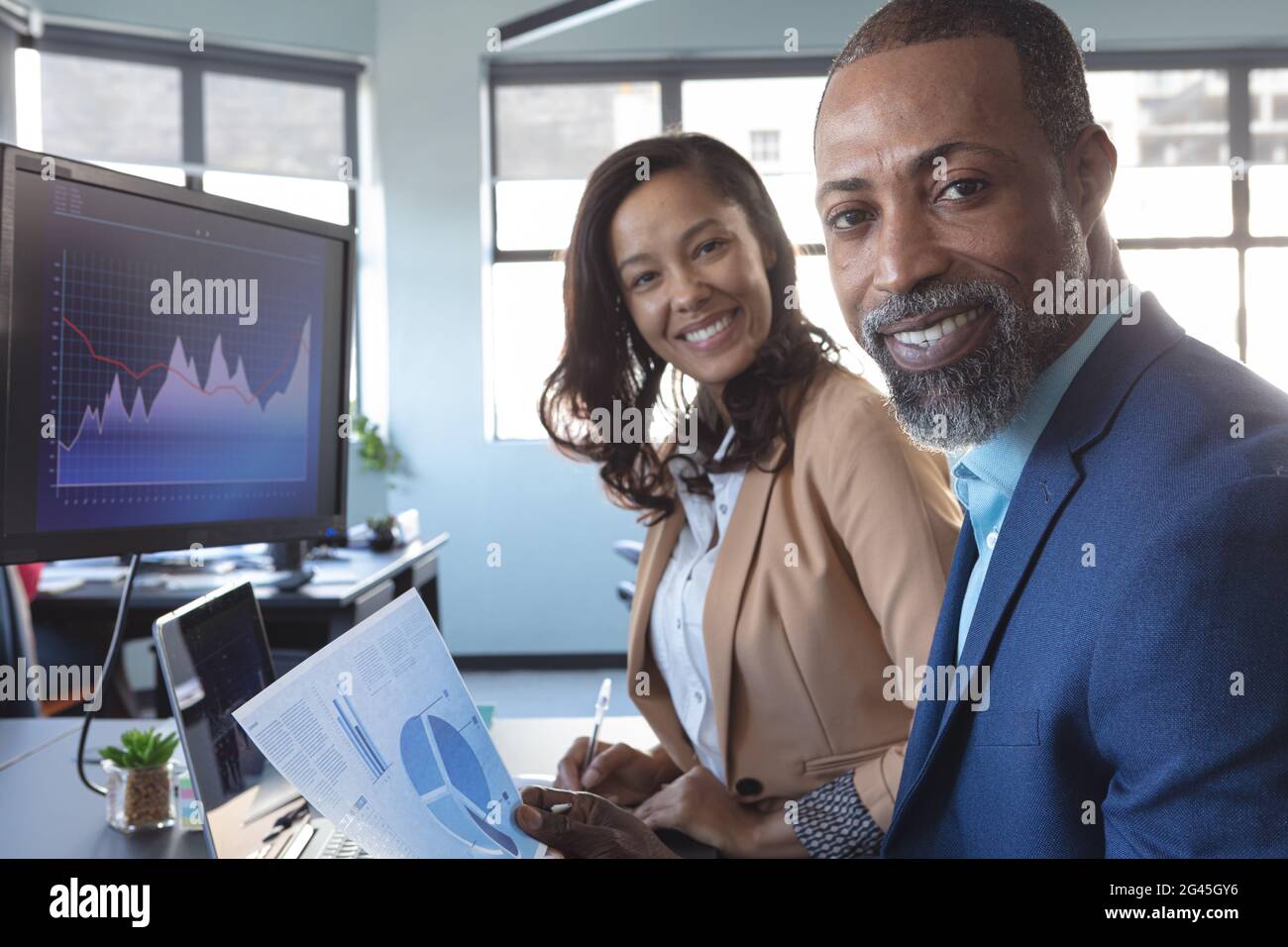 Smiling design professionals using hi-res stock photography and images ...