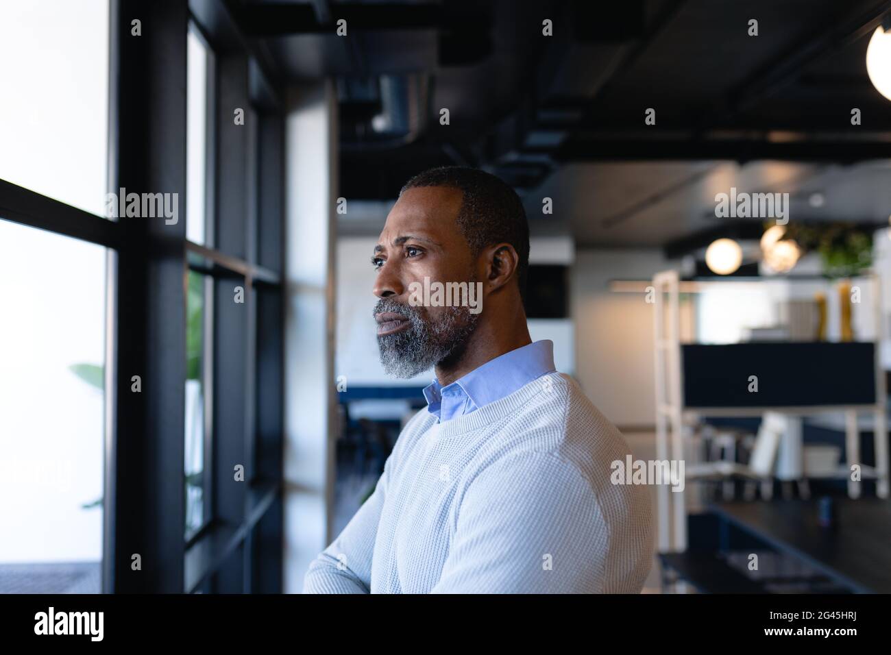 African American man looking outside Stock Photo - Alamy