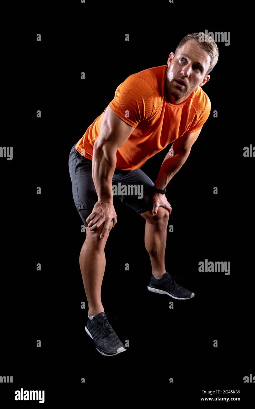 Athletic man after exercise Stock Photo - Alamy