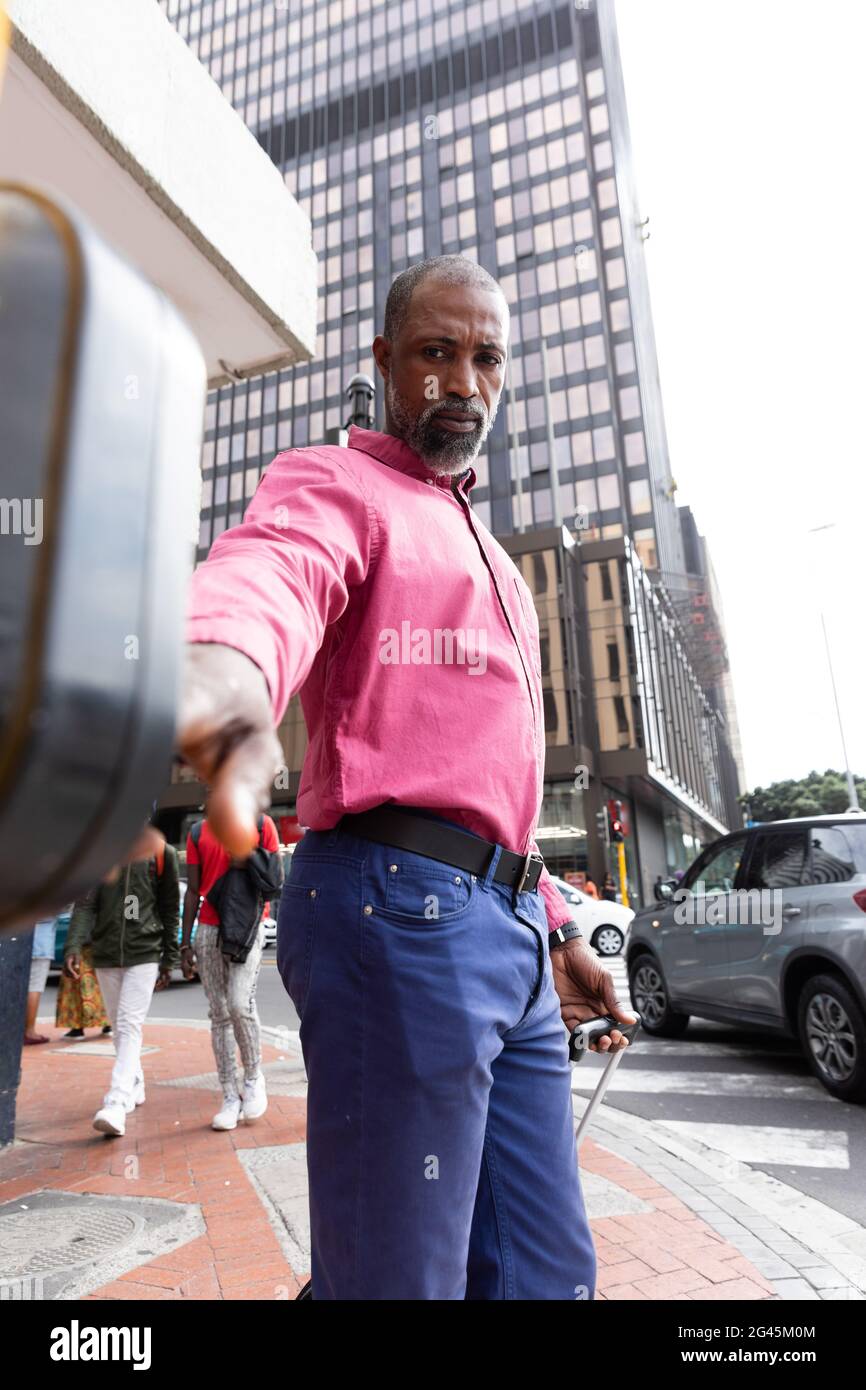 African American man using security signal Stock Photo - Alamy