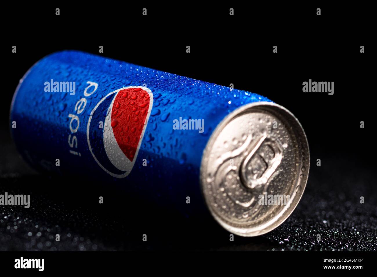 Editorial photo of Pepsi can with water droplets on black background ...