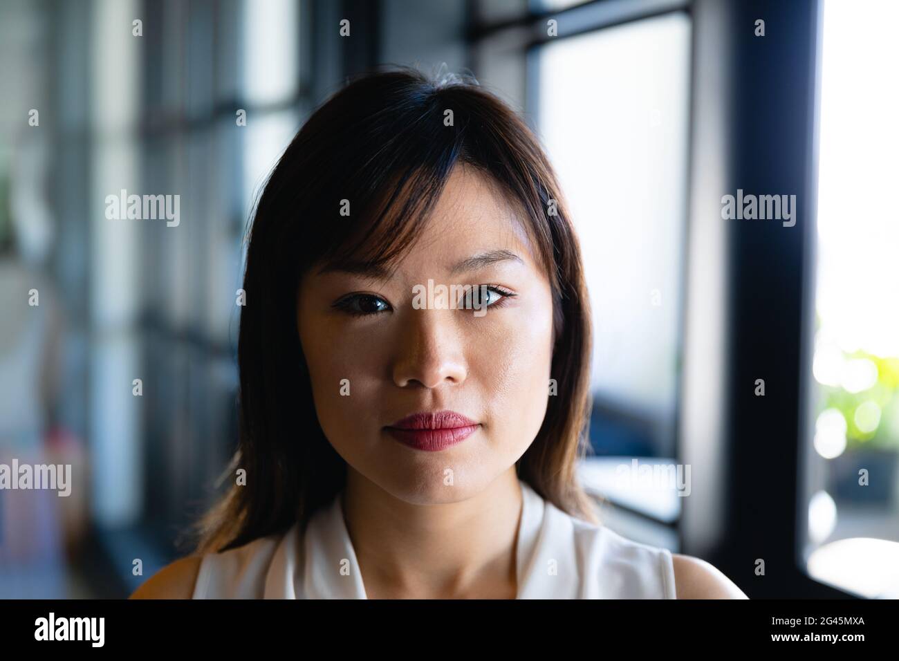 Front view of an Asian women Stock Photo - Alamy