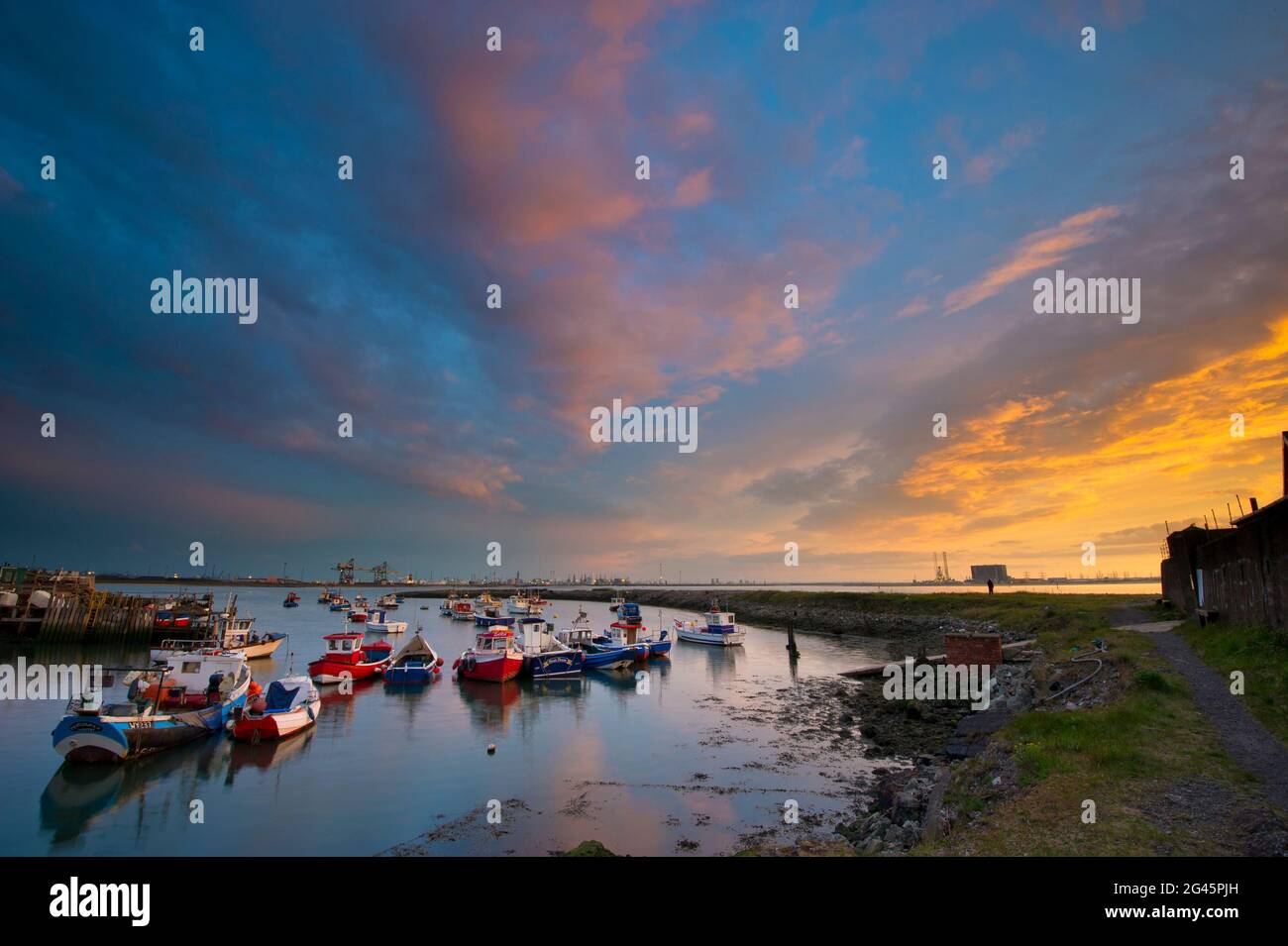 Small Fishing Boats in a Small Harbour with the Commercial Docks and a ...