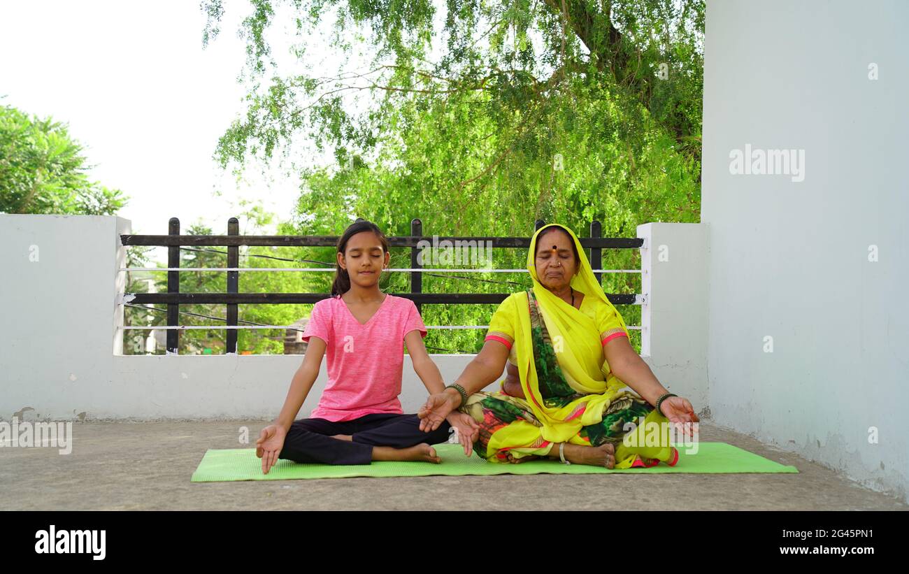 Jaipur, Rajasthan, India - June 2021: Yoga concept. Asian little cute ...