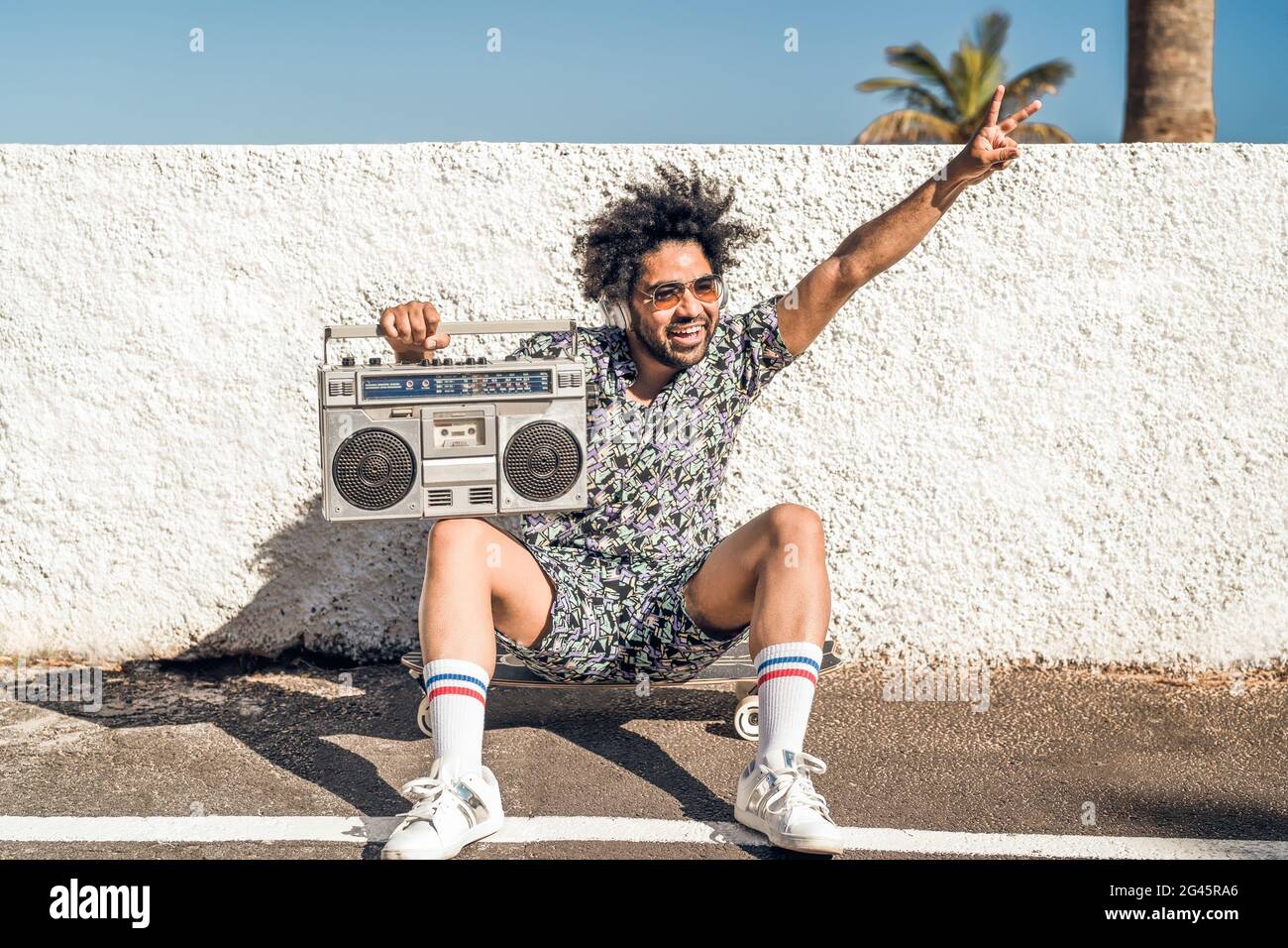 Person listening boombox hi-res stock photography and images - Alamy