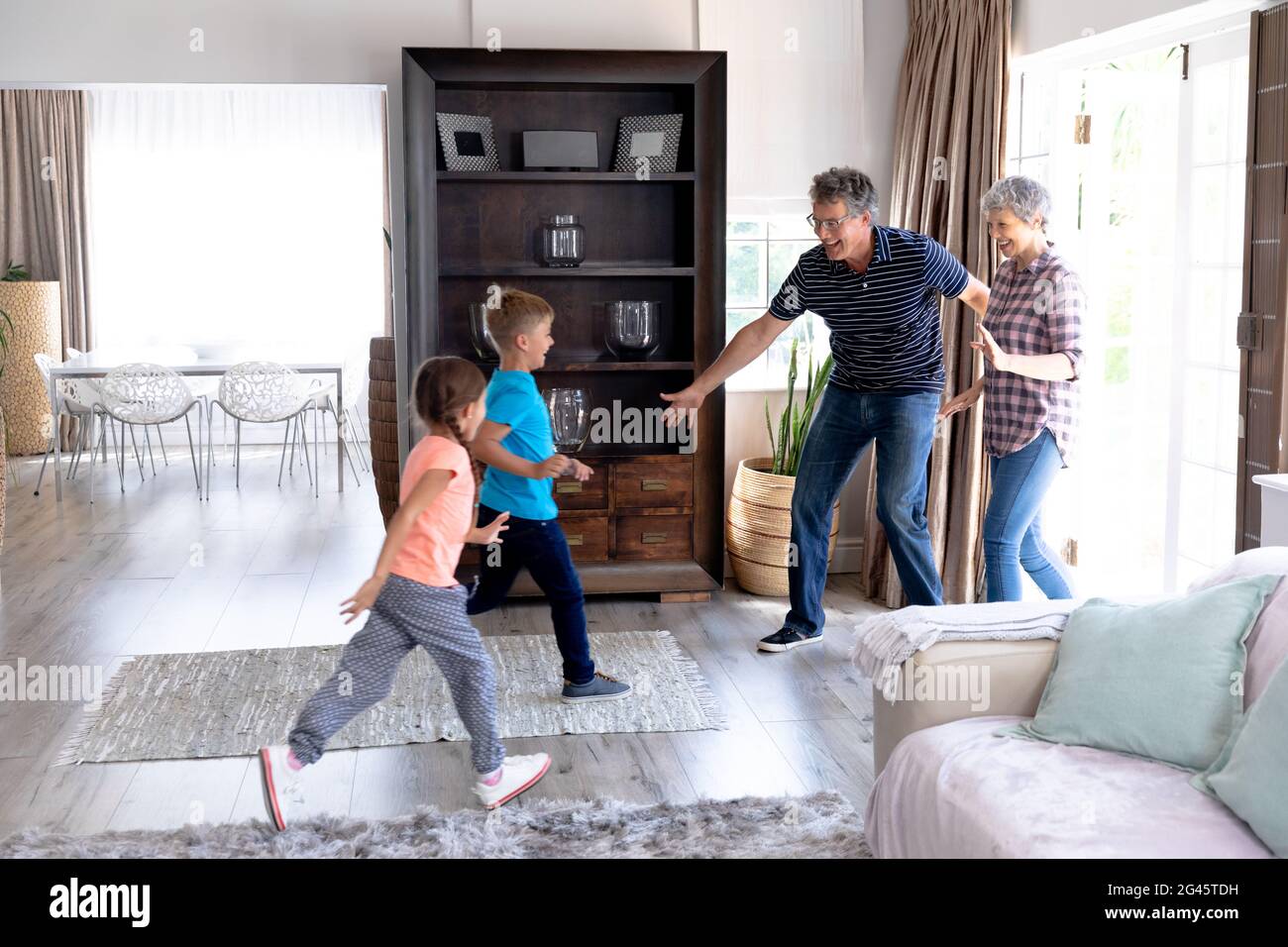 Girl entering house hi-res stock photography and images - Alamy