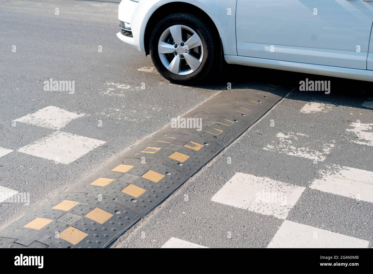 speed bump on the city road. asphalt barrier, safety obstacle Stock ...