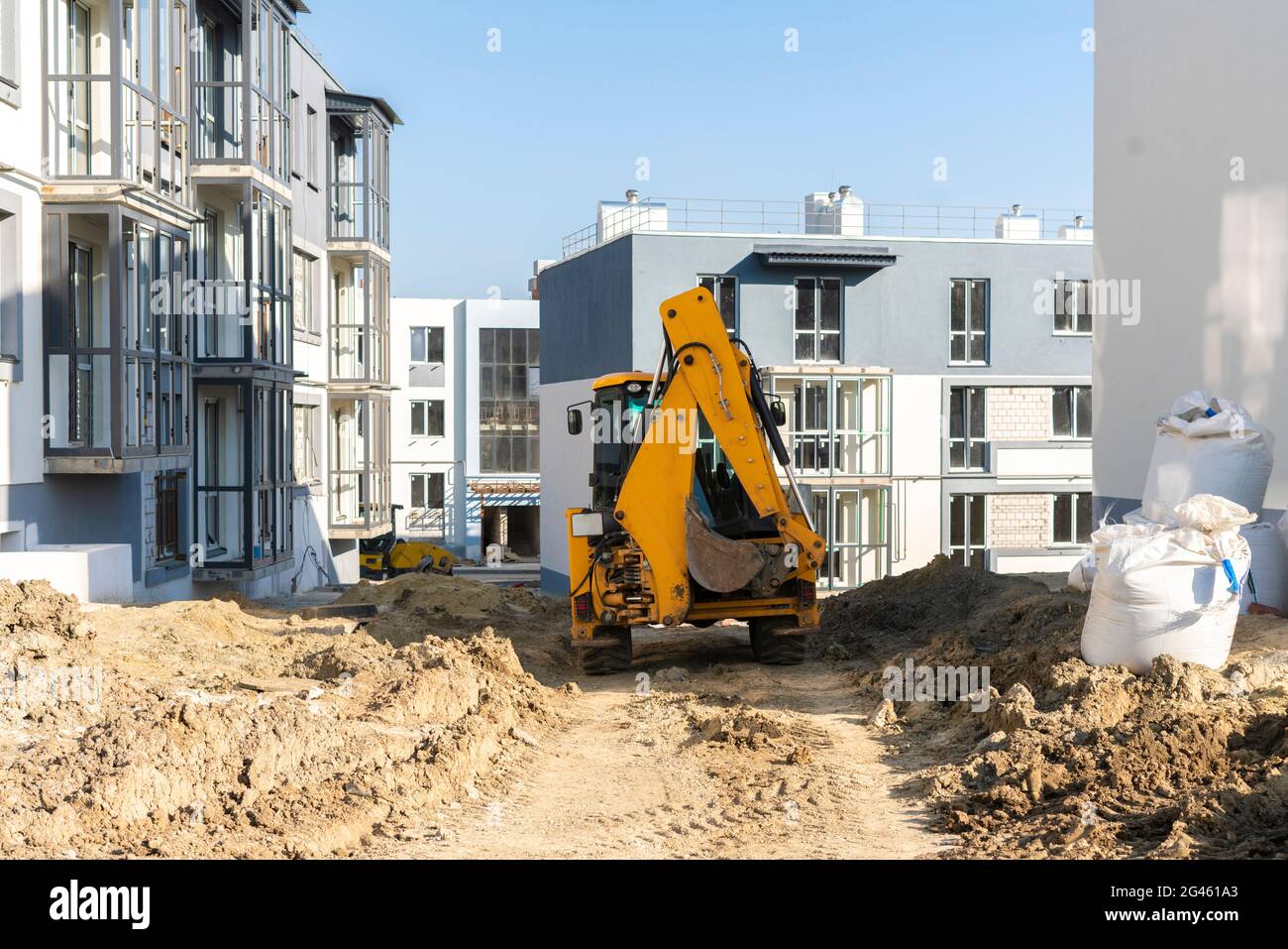 some machines on the construction site, working and building process ...