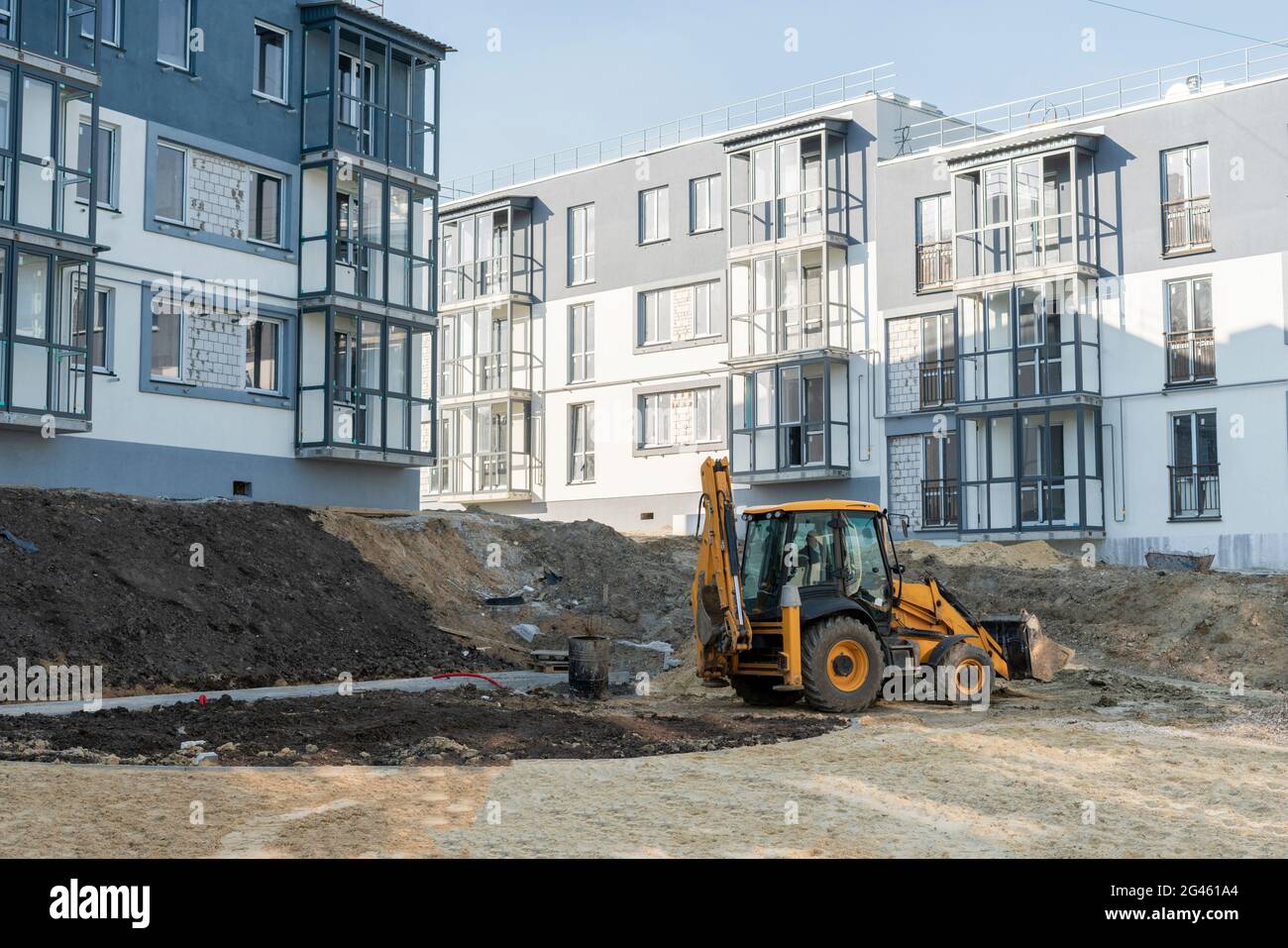 some machines on the construction site, working and building process ...