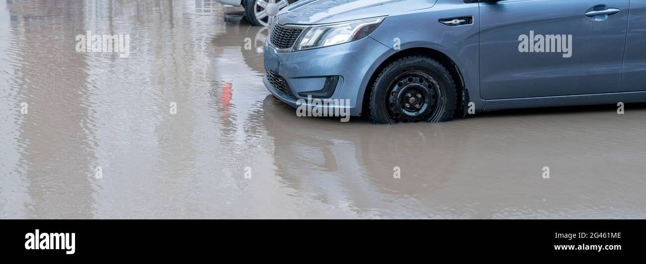 cars move in water road, flood disaster outside Stock Photo - Alamy