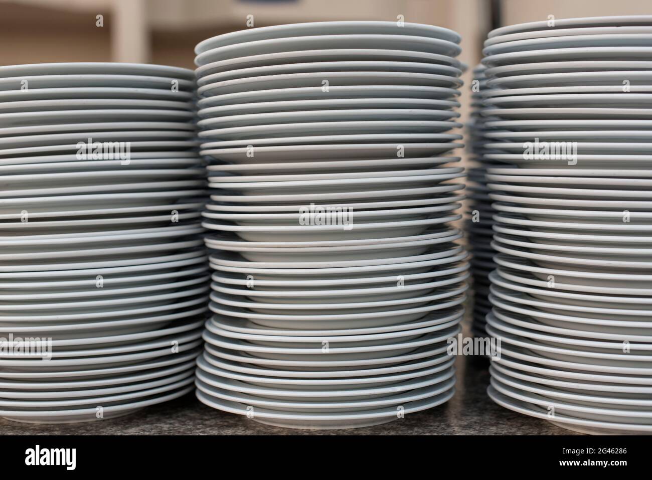 A lot of clean plates in the restaurant Stock Photo - Alamy