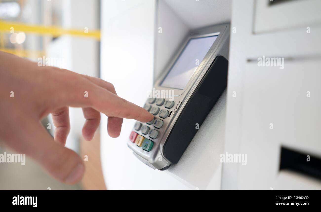 person's hand enter password and push buttons to make a payment Stock ...