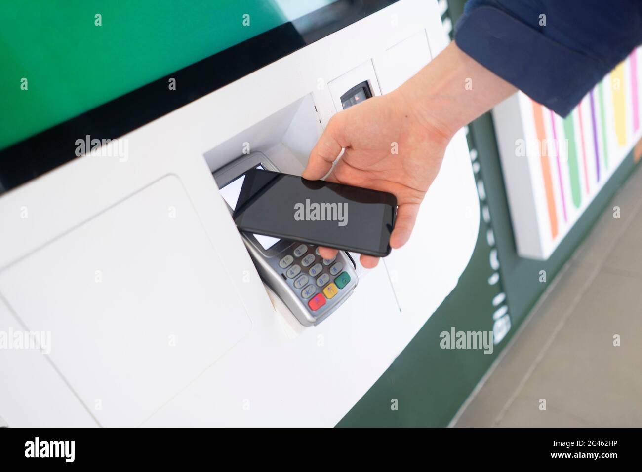 cashless payment with phone to POS terminal with NFC technology Stock ...