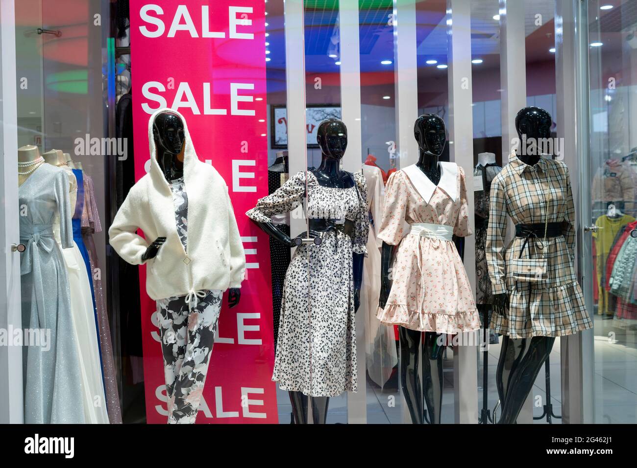 sale or discount retail shop of clothes boutique Stock Photo - Alamy