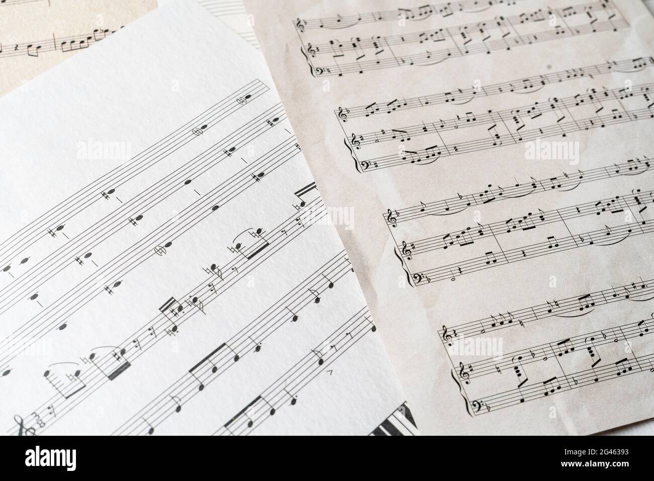 close up ancient old paper sheet with music notes, classic culture arts ...