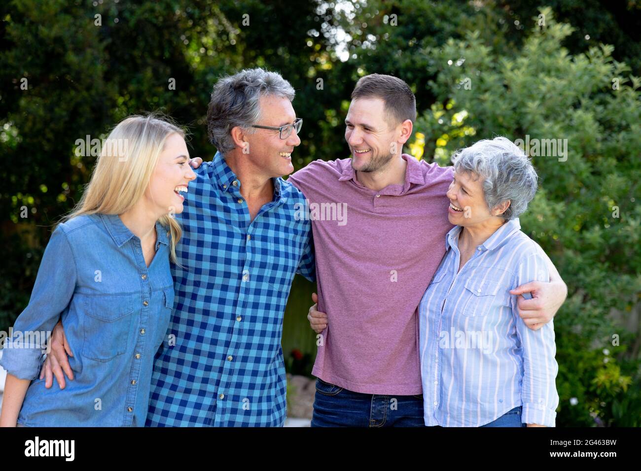 Senior Caucasian Couple And Their Adult Son And Daughter Spending Time