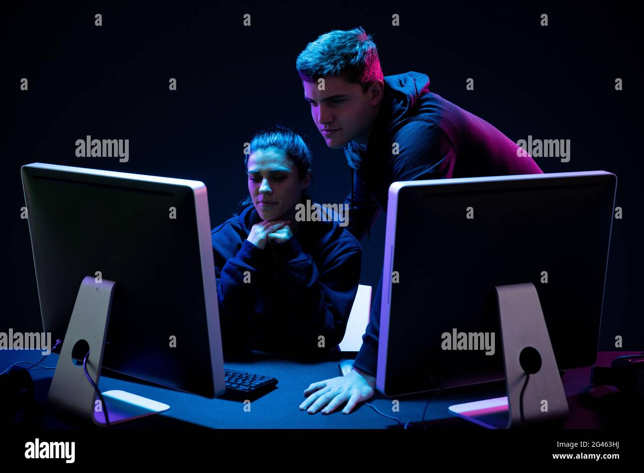 Black background working late hi-res stock photography and images - Alamy